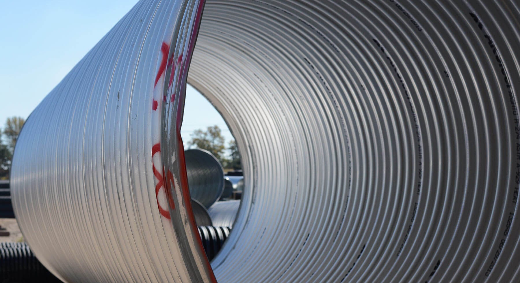 Metal channeling - HEL-COR CSP - Armtec - for drainage systems / perforated