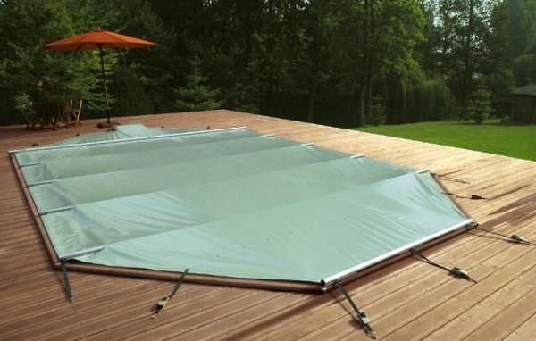 Swimming pool cover with rods - PISCINELLE - security