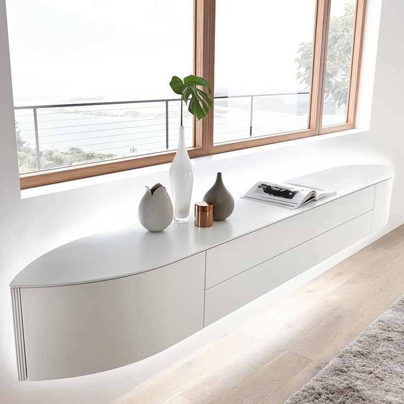 Wall-mounted sideboard - NAVIS - hülsta - contemporary / ceramic / walnut