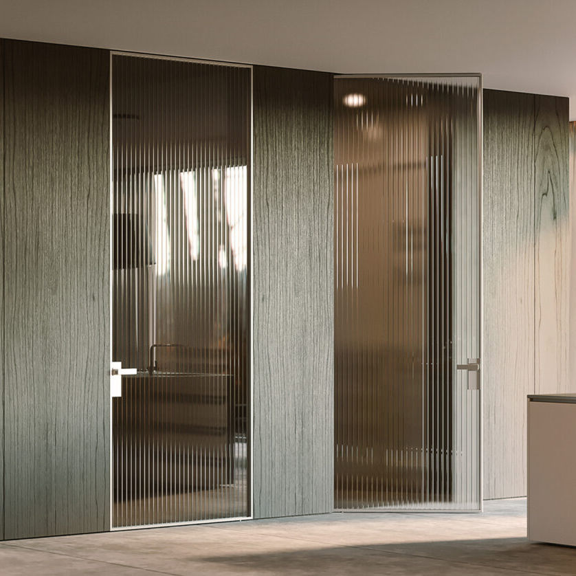 Interior door - LINEA - LINVISIBILE - glass / anodized aluminum ...