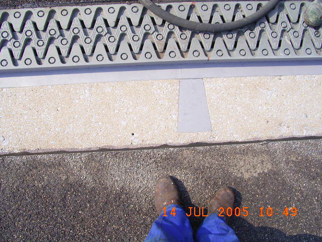 Polymer concrete expansion joint - ROBO-STATIFLEX - Mageba - road / drive-over / modular