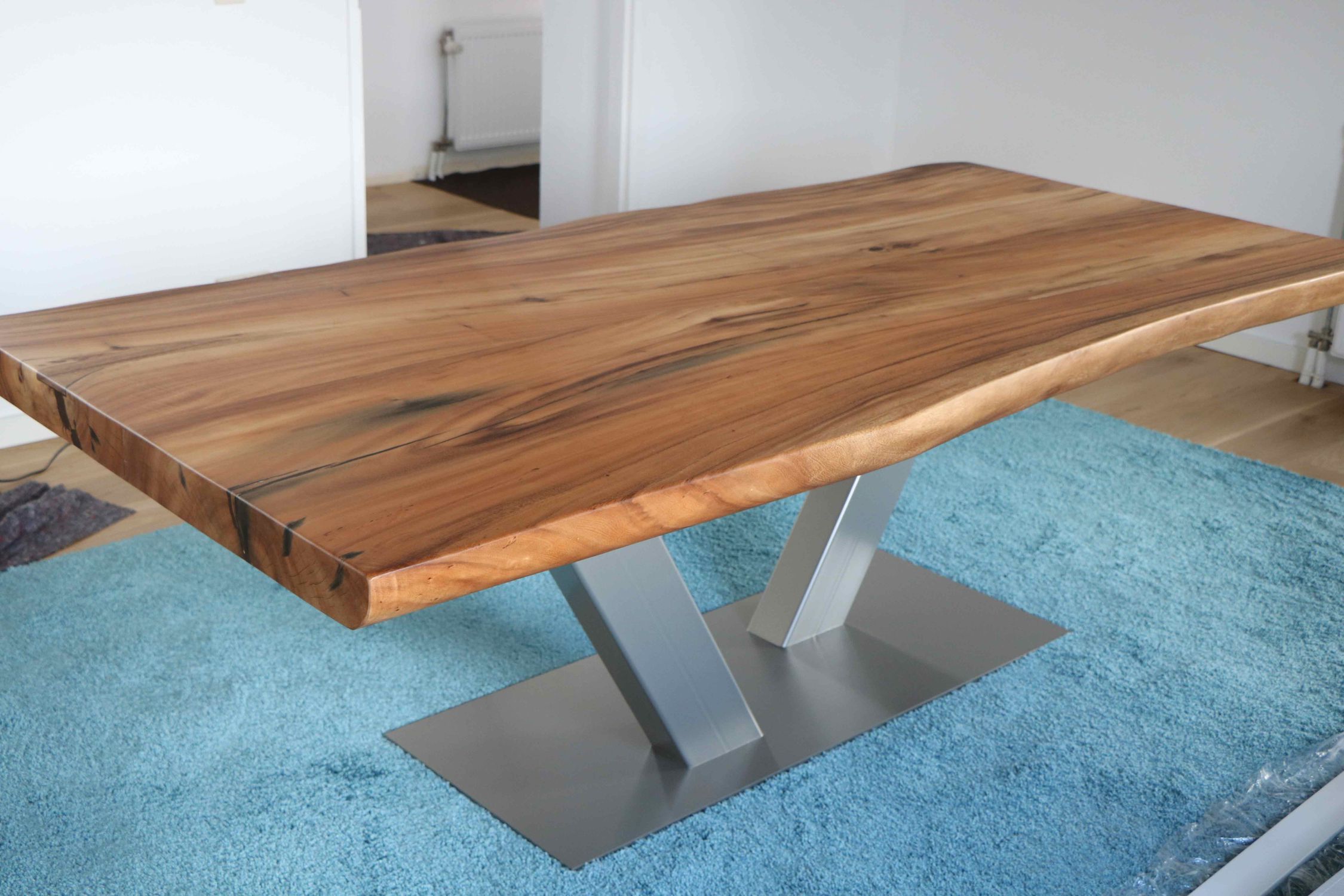 Contemporary dining table - SUAR - Unik - walnut / solid wood ...
