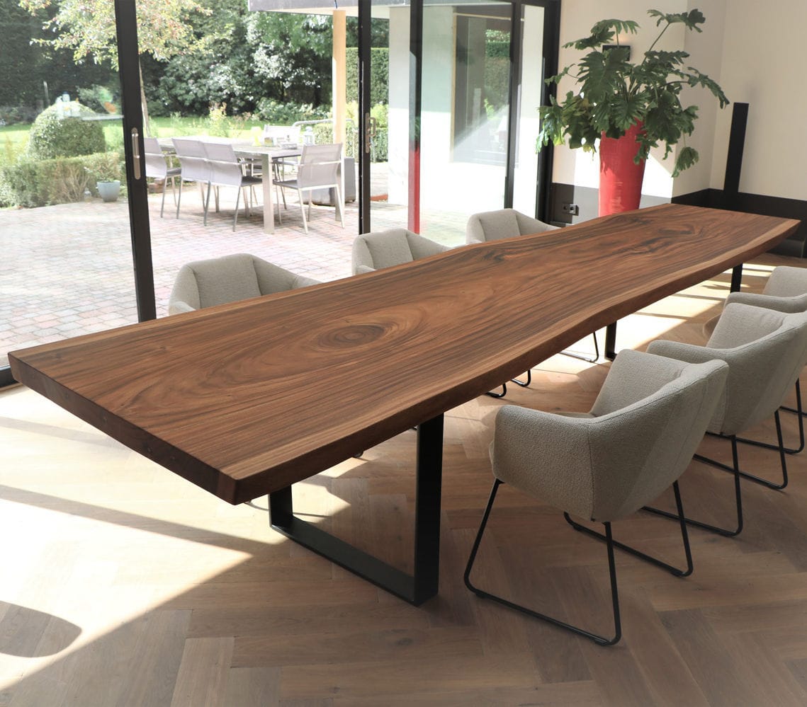 Contemporary dining table - Suar - Unik - solid wood / steel base ...