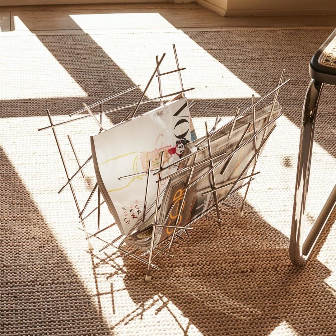 Original design magazine rack - BLOW UP - ALESSI S.P.A. - home / steel ...