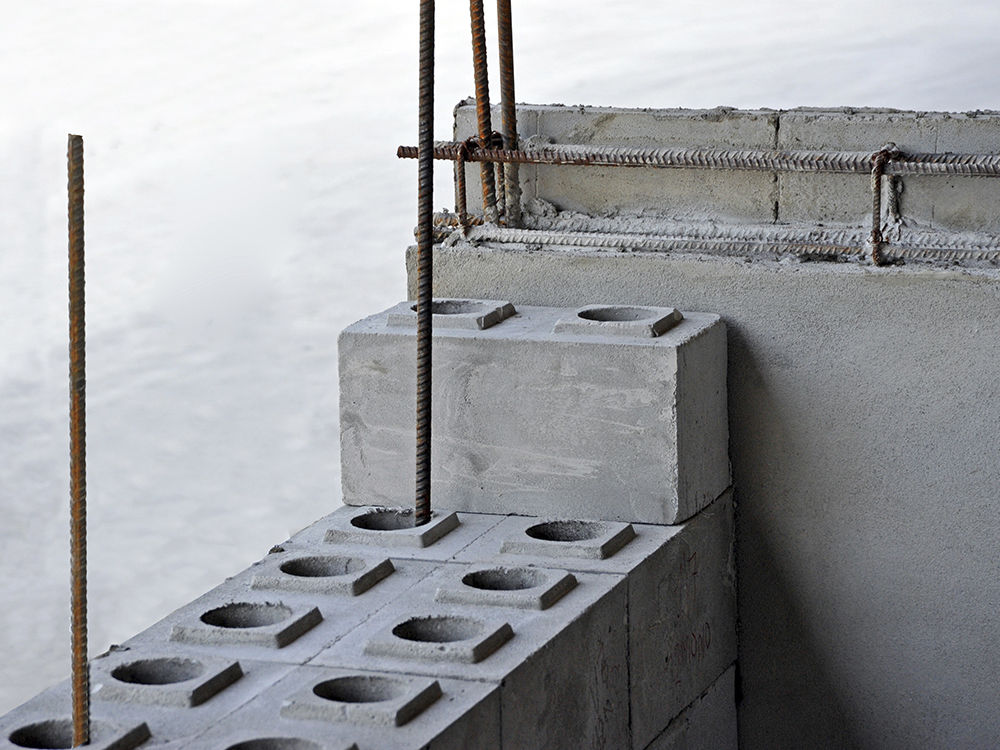 Hollow concrete block / cellular / for load-bearing walls / anti ...
