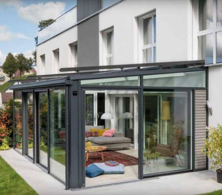 Aluminum conservatory - Penta - Finstral - PVC / with sliding door
