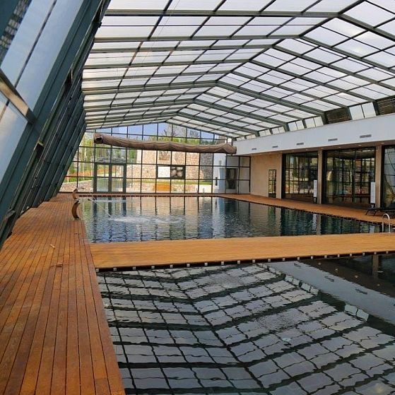 High swimming pool enclosure - EVOLUTION LEAN-TO - Evergreen Solutions ...