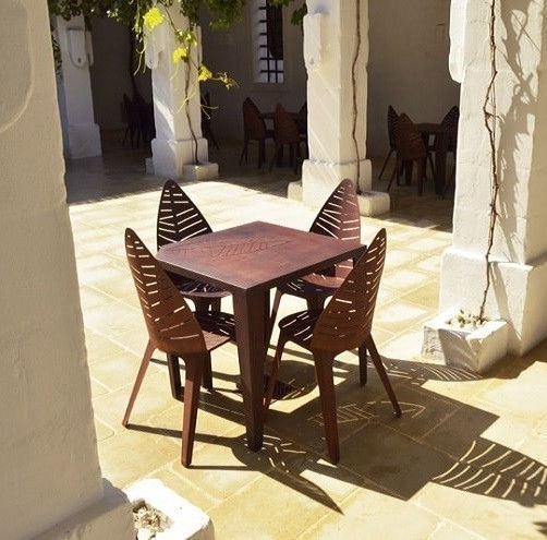 Contemporary table - LILA - Trackdesign - COR-TEN® steel / steel base ...