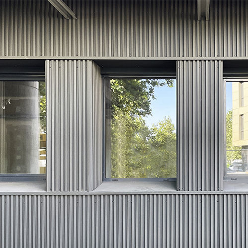 Panel cladding - TOYS - ATELIERS 3S - sheet metal / ribbed