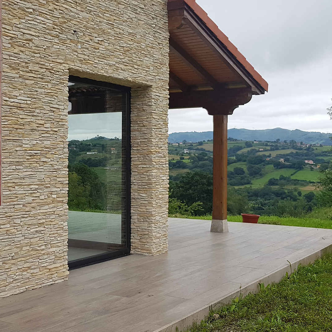 Stone wall cladding - LEÓN - Thermostone - indoor / exterior / glued