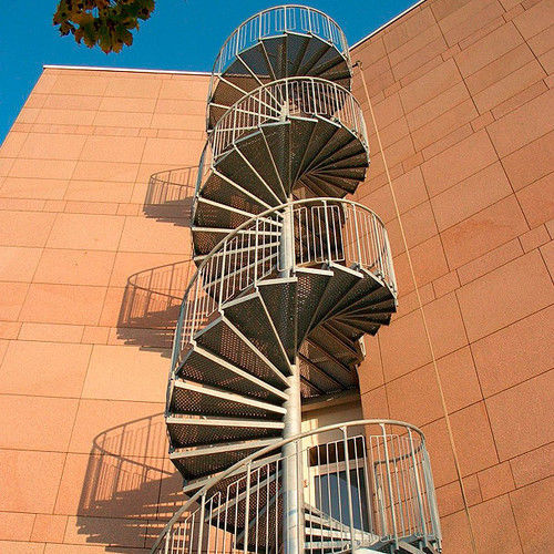 Spiral staircase - GRAEPEL - metal grating / metal frame / outdoor