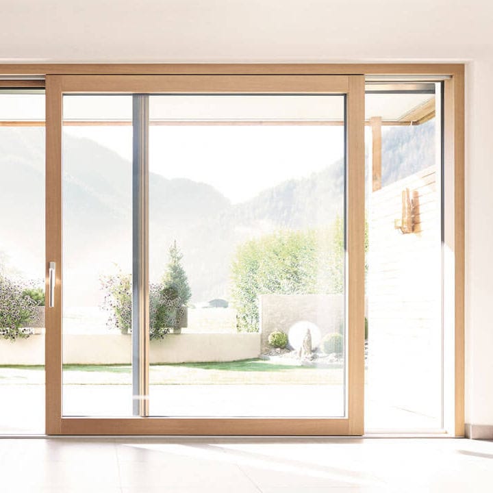 Sliding patio door - SL 179 - SOLARLUX - lift-and-slide / wooden / aluminum