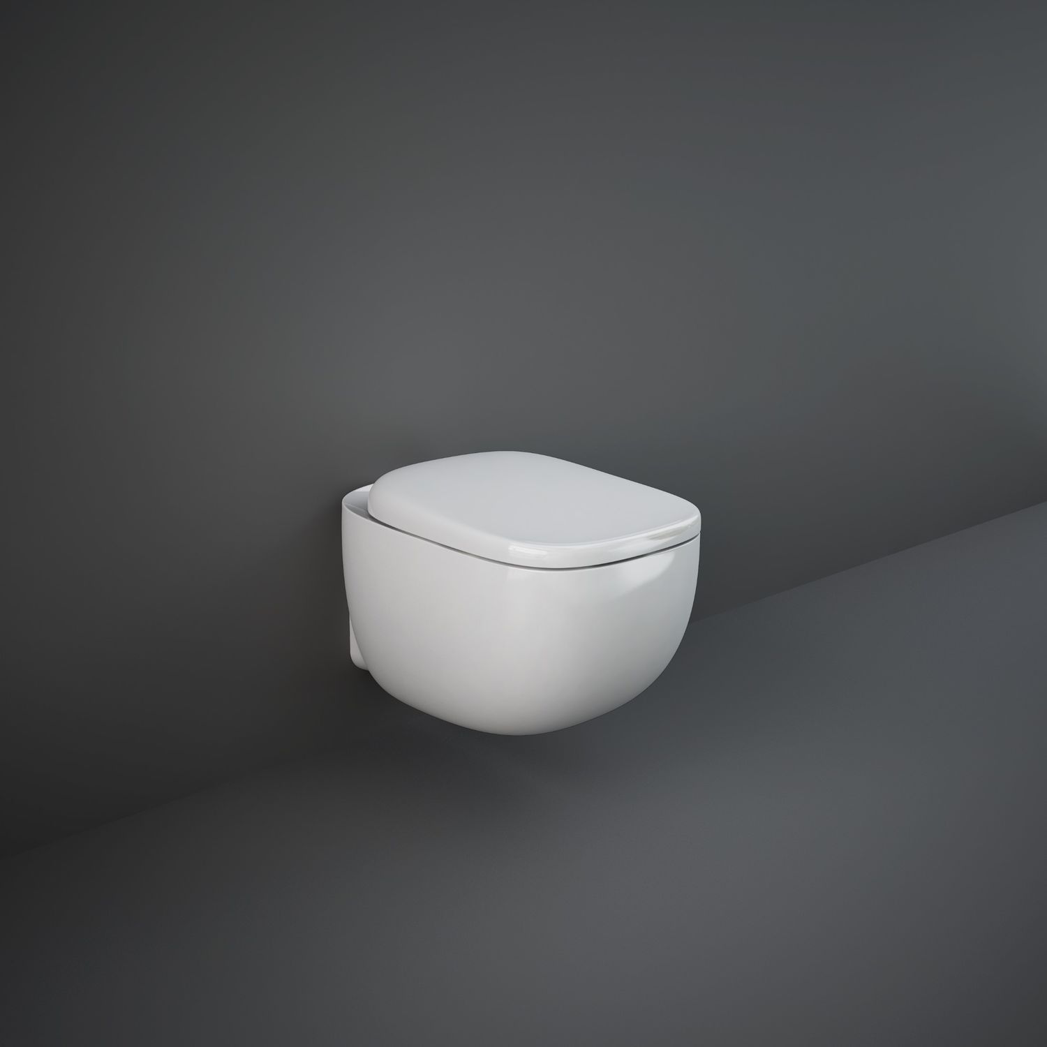 Wall-hung toilet - RAK-ILLUSION - RAK Ceramics - ceramic / rimless / modern