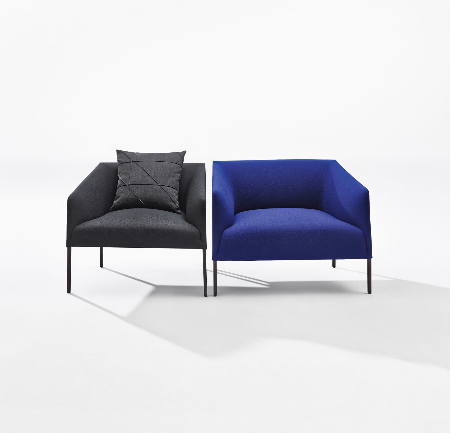 Contemporary armchair - SAARI - Arper - leather / fabric / black