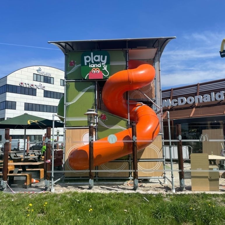 Tubular slide - SPI Global Play - curved / for public building / for ...