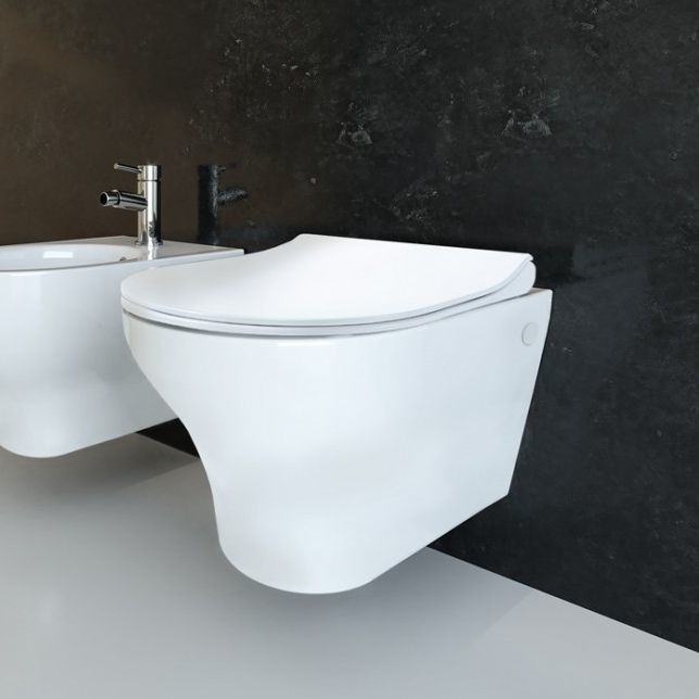 Wall-hung WC - SOLI - Ceramica Althea - ceramic / home / oval
