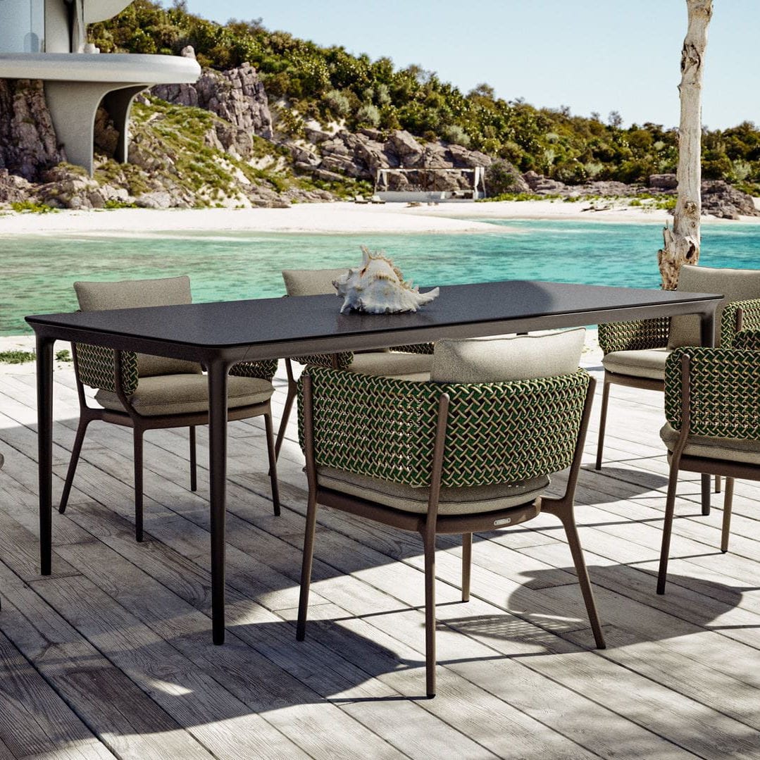 Contemporary dining table - BELLMONDE - DEDON GmbH - HPL / composite ...