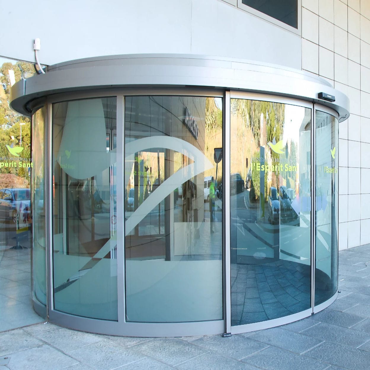 Revolving door - Manusa - entry / metal / glass