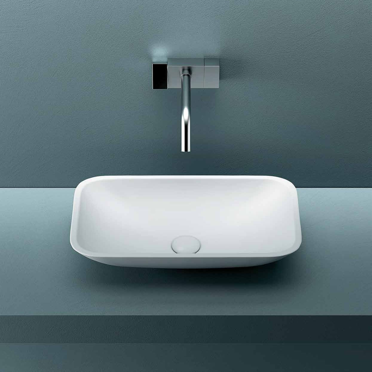 Countertop washbasin - STRETCH - PLANIT - Corian® / rectangular ...