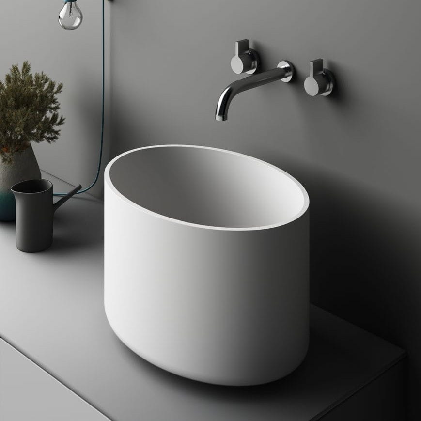 Countertop washbasin - TRIADE 2 - PLANIT - Corian® / custom / oval