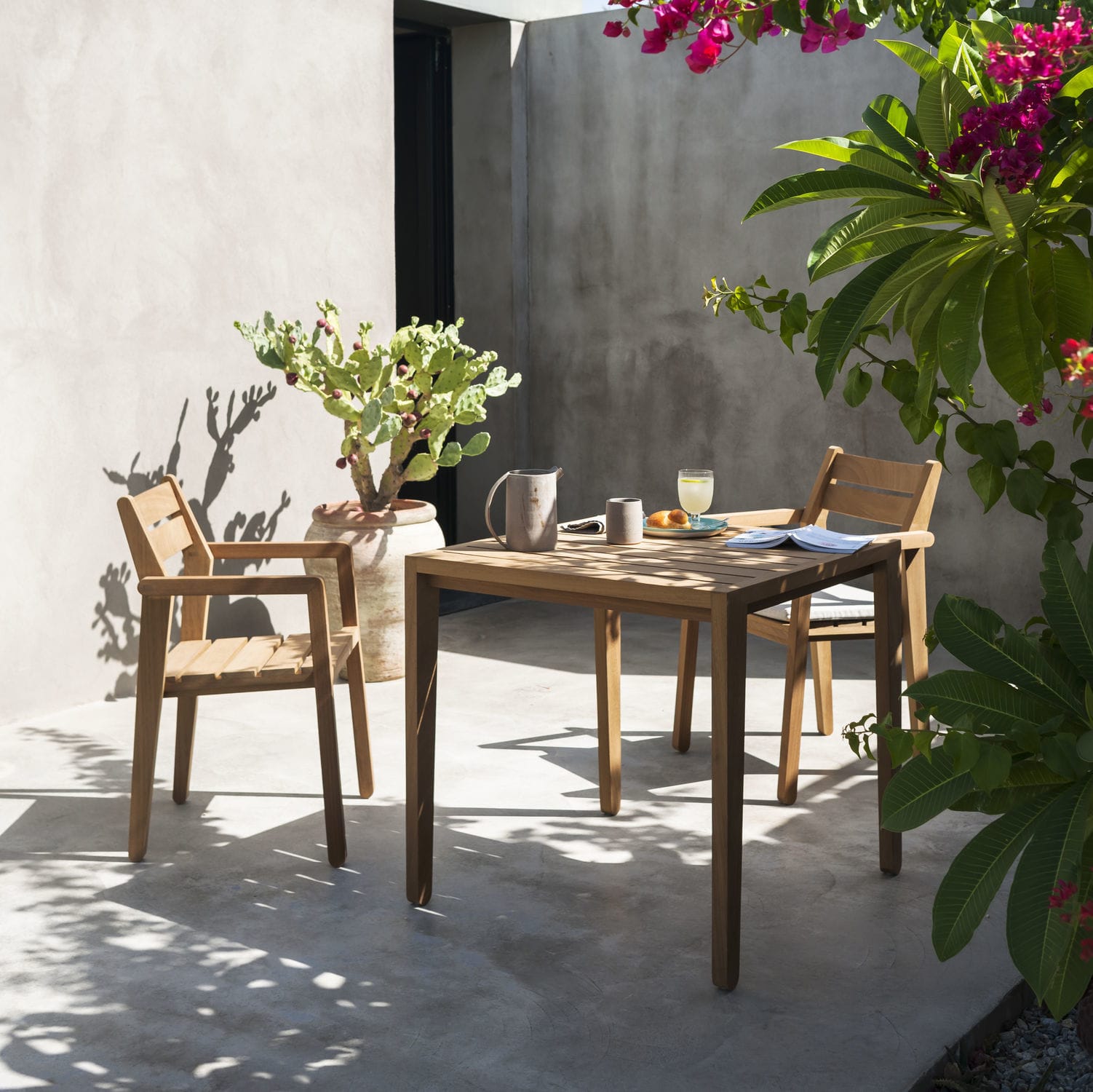 Contemporary dining table - ZANIA 080 - RODA - iroko / iroko base / square