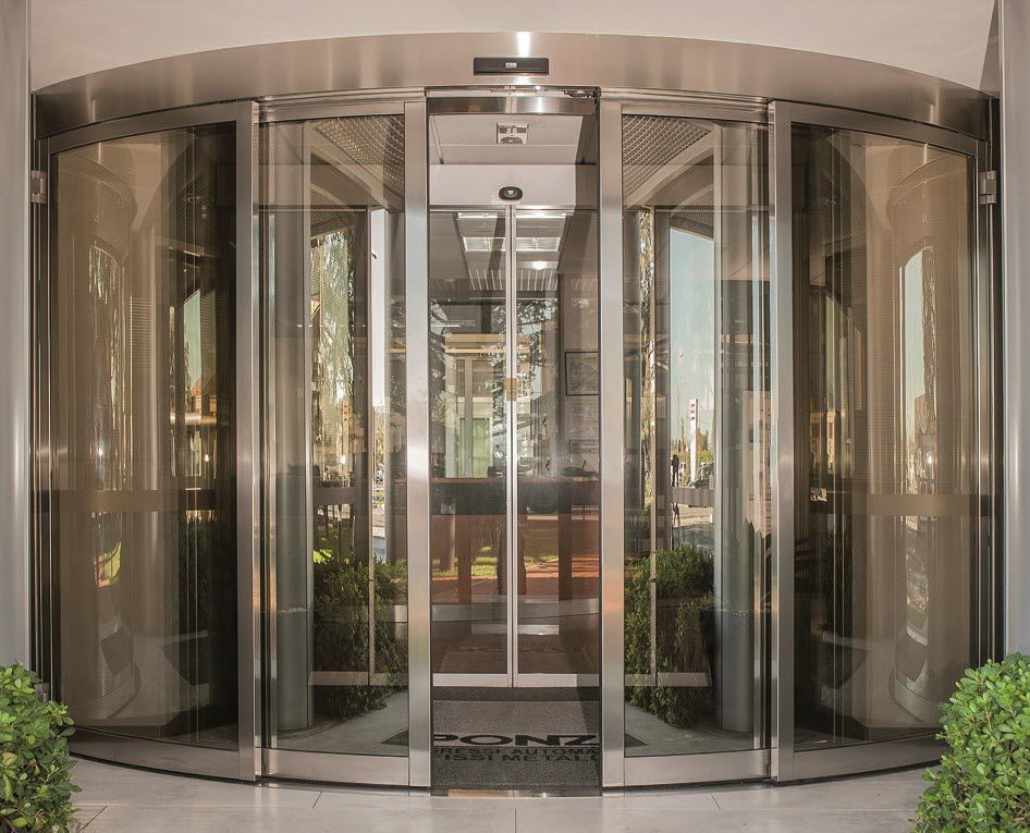 Entry door - LOWERED ARCH - Ponzi - aluminum / sliding / glazed