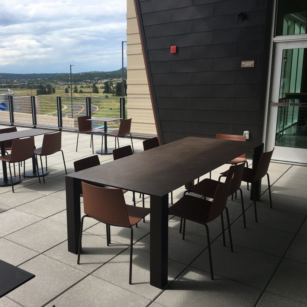 Contemporary dining table - WIND - Andreu World - ceramic / aluminum / rectangular