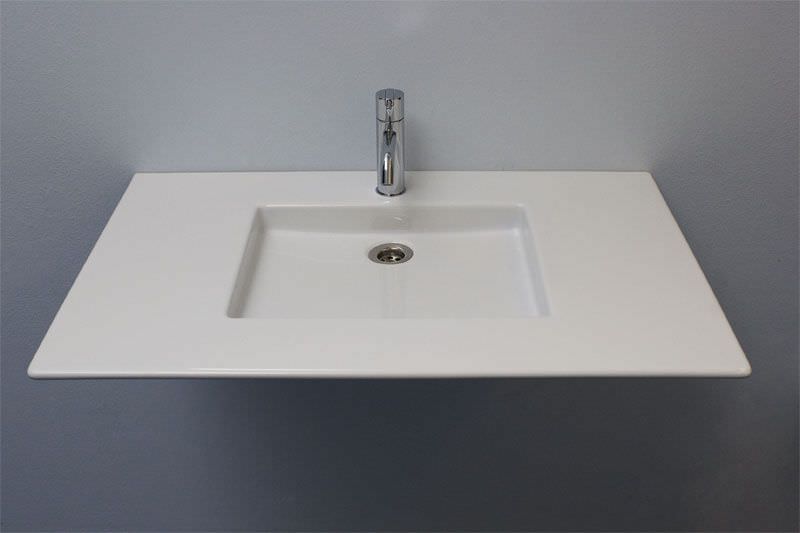 Wall-mounted washbasin - ALBEUS - Rapsel International Srl - ceramic ...