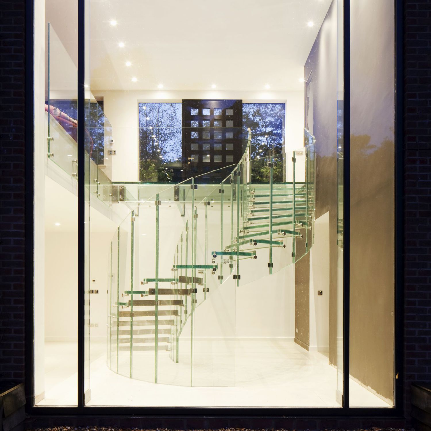 Helical staircase - FLY - HELICAL DESIGN - Siller Stairs - glass step ...