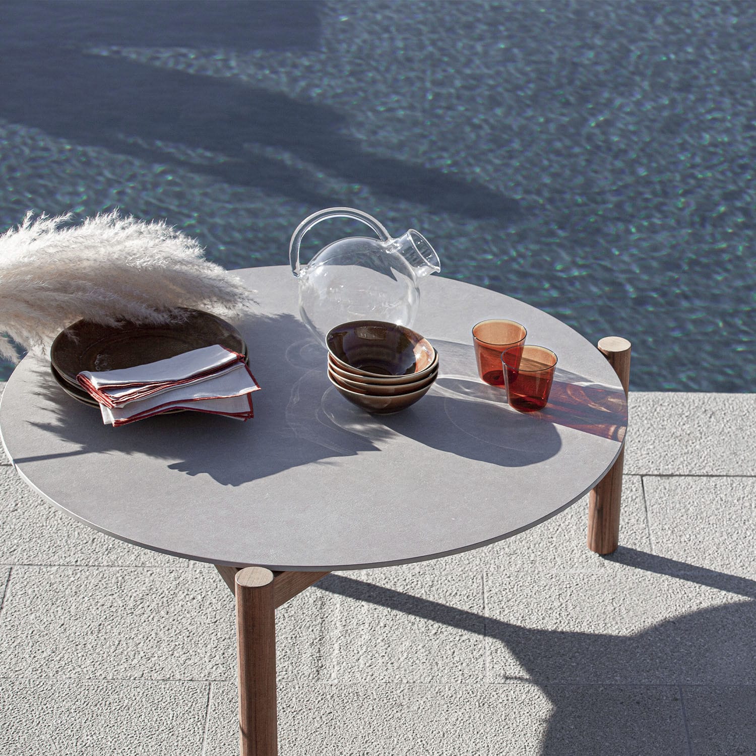 Contemporary coffee table - LODGE - Atmosphera - sandstone / teak base ...