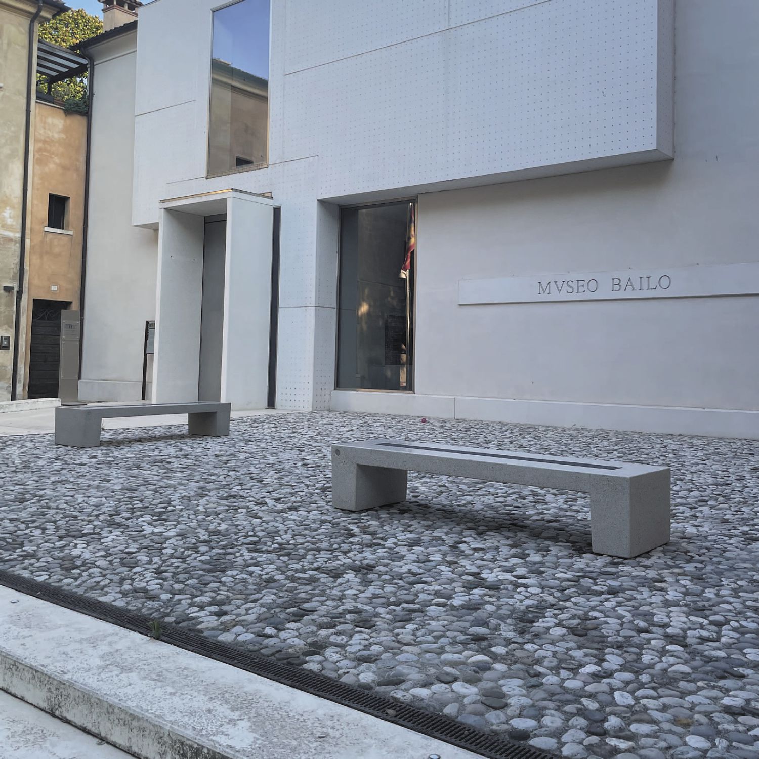 Modern public bench - SARAH SMART - METALCO - engineered stone ...