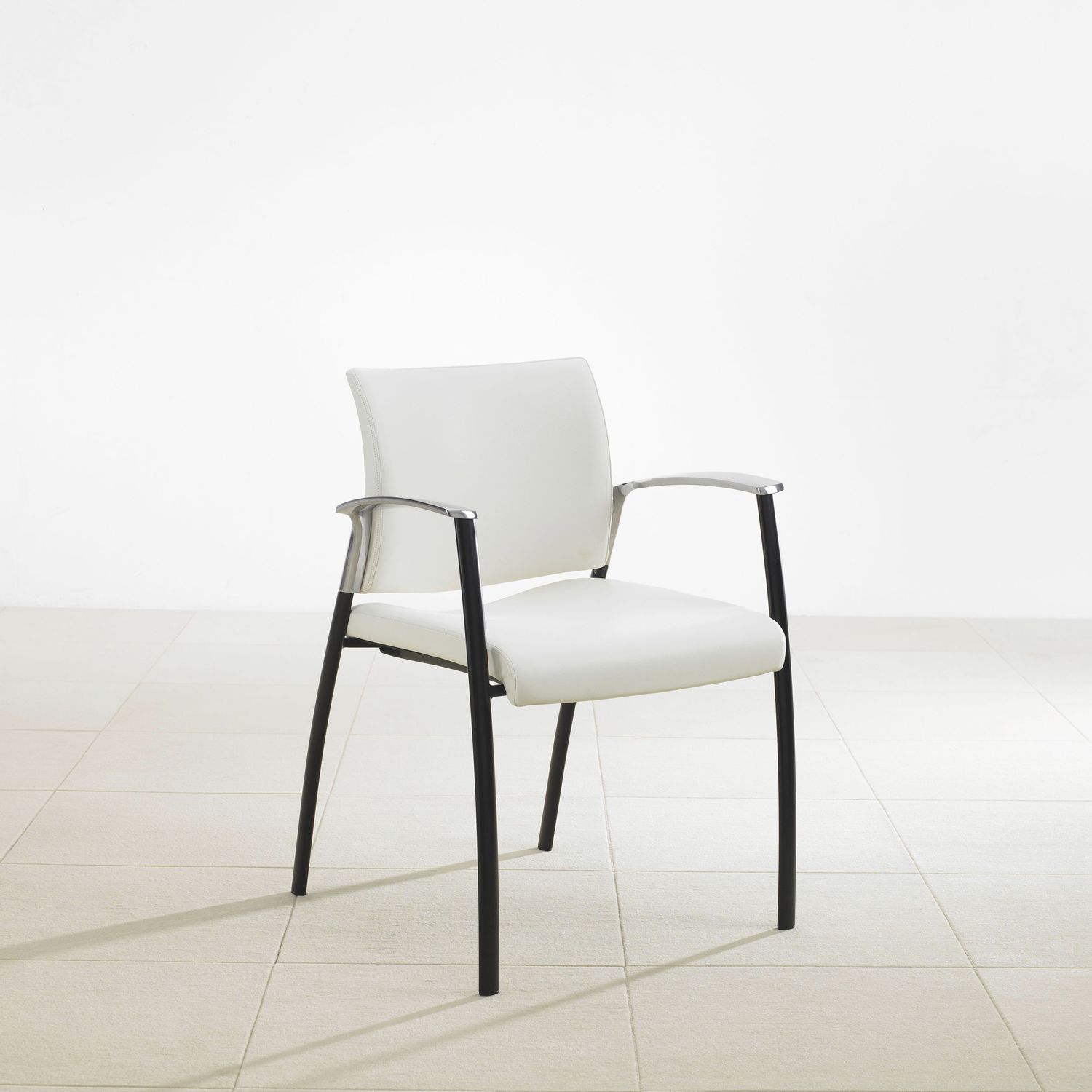 Contemporary visitor chair - SITARA - Teknion - ebony / plastic / steel