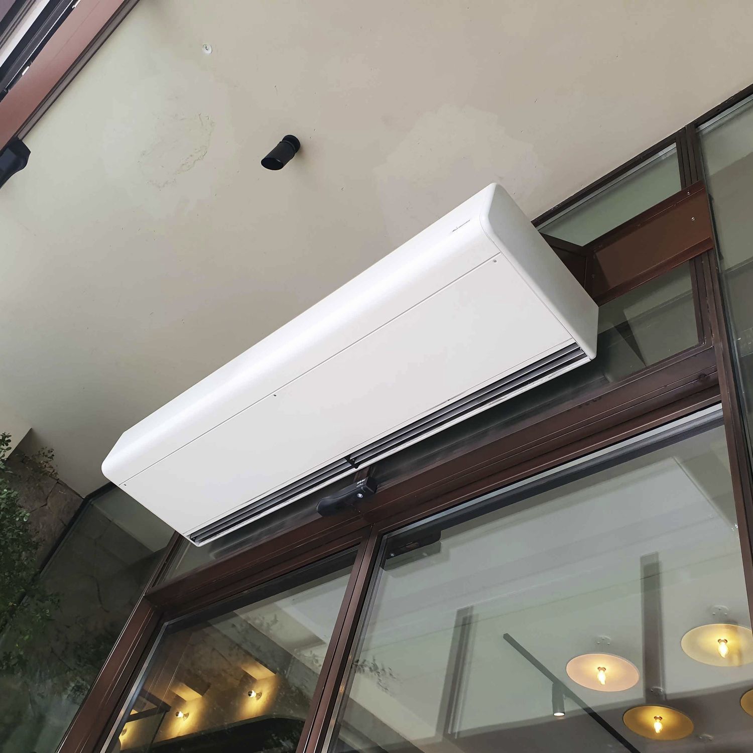 Ceiling-mounted air curtain - SMART ECM 1500 A FC - airtecnics - wall ...