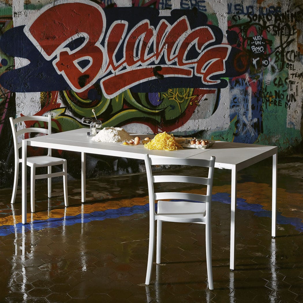 Contemporary table - PIET - Colico - sheet steel / aluminum base ...