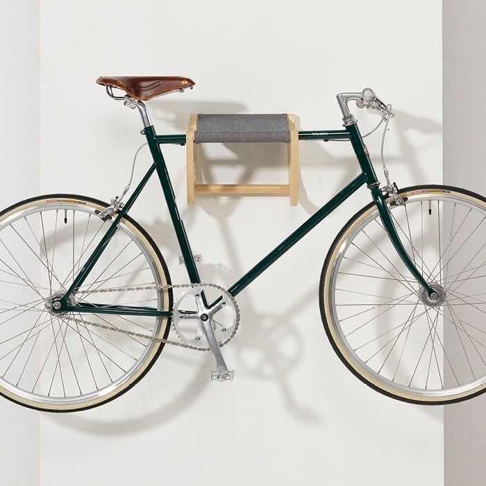 Wall-mounted bike rack - René - Zilio A&C - horizontal / interior / wooden