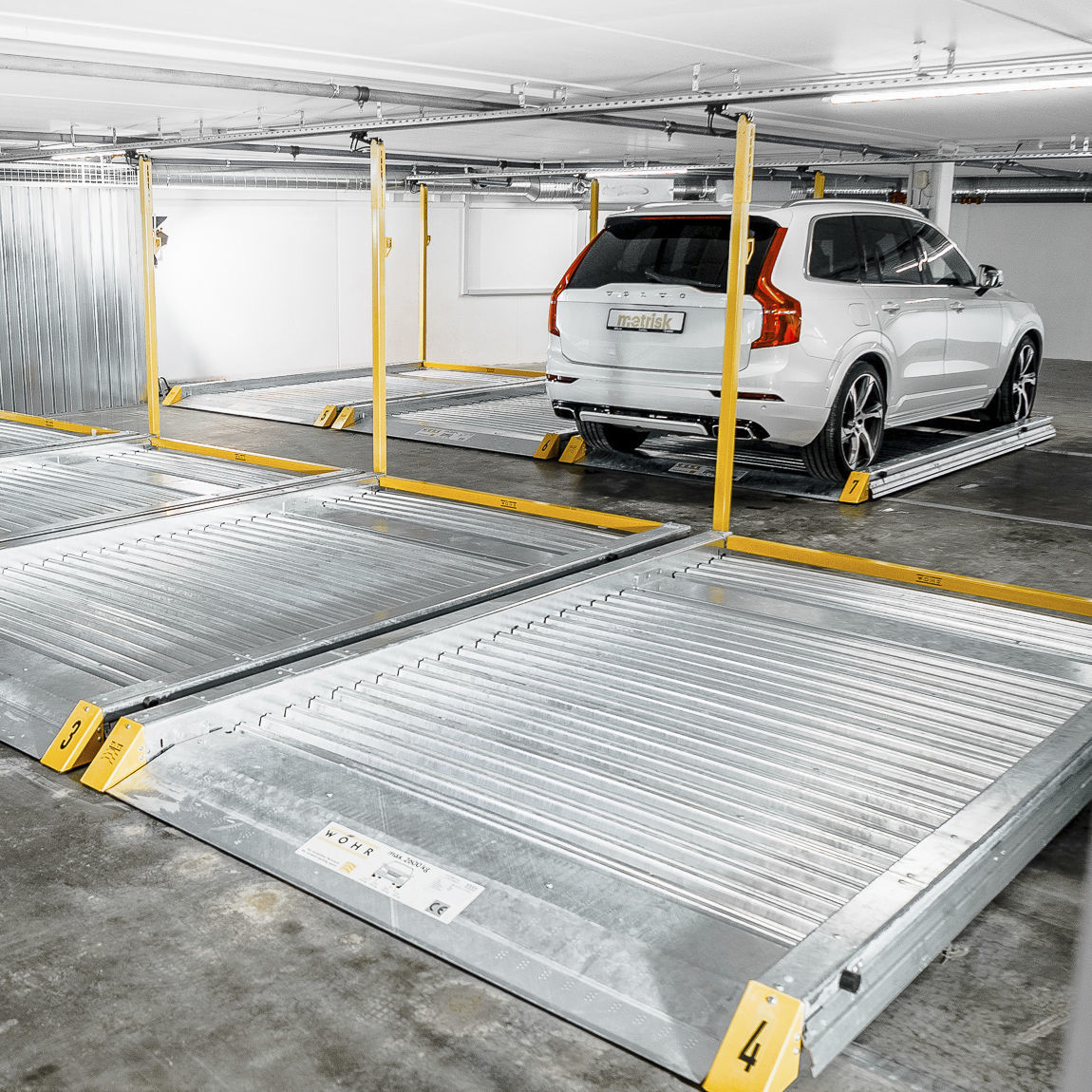Sliding parking platform - 501 - WÖHR Autoparksysteme - hydraulic ...