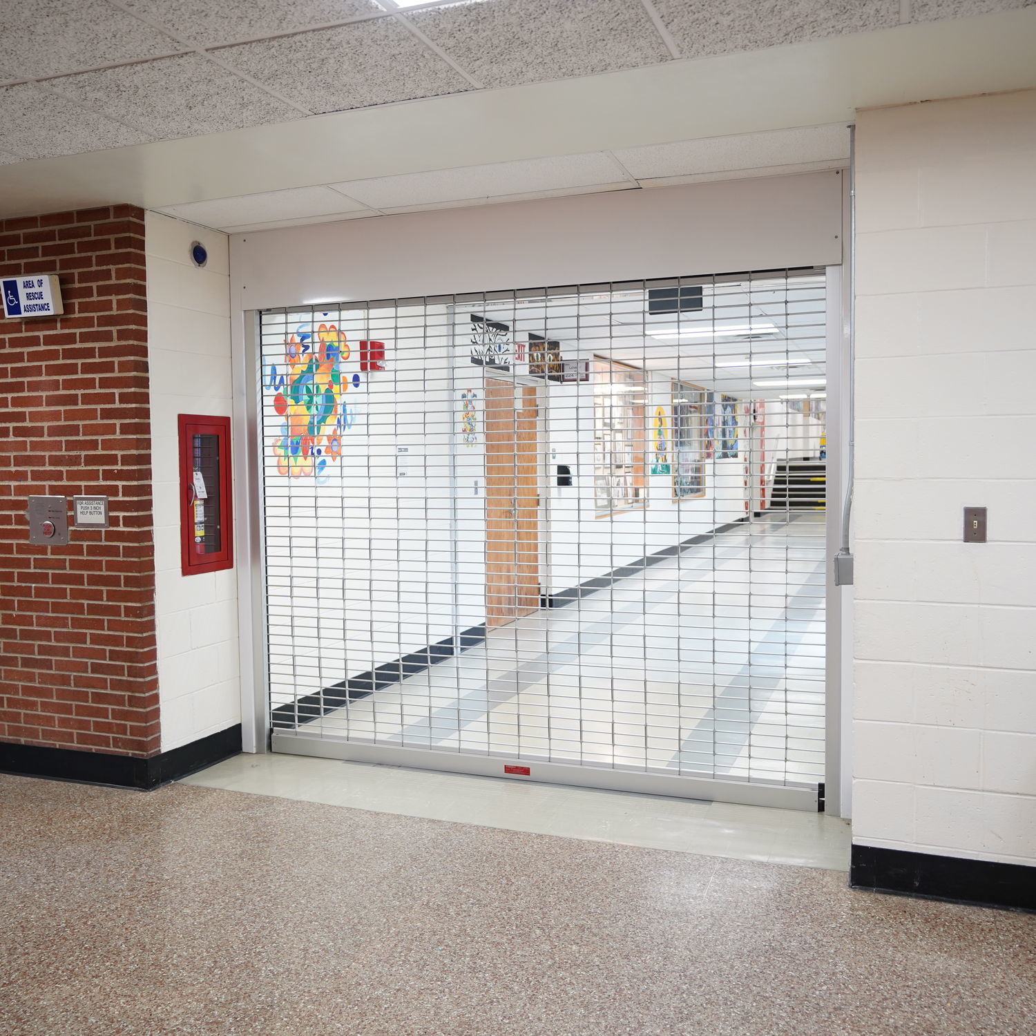 Roll up security grille - CROSSINGGARD® & THREATPROTECT™ - Cornell ...