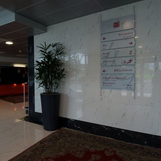 Wall-mounted signboard - ROD BAR S-PARETE - STUDIO T - stainless steel ...