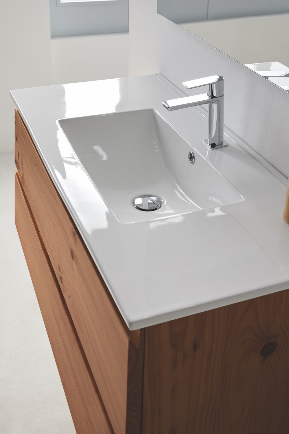 Built-in washbasin - CAMBRILS - Naxani - ceramic / with counter / multiple