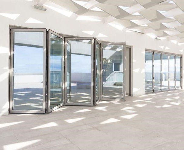 Sliding and stacking patio door - SMARTIA M19800 - ALUMIL - folding ...