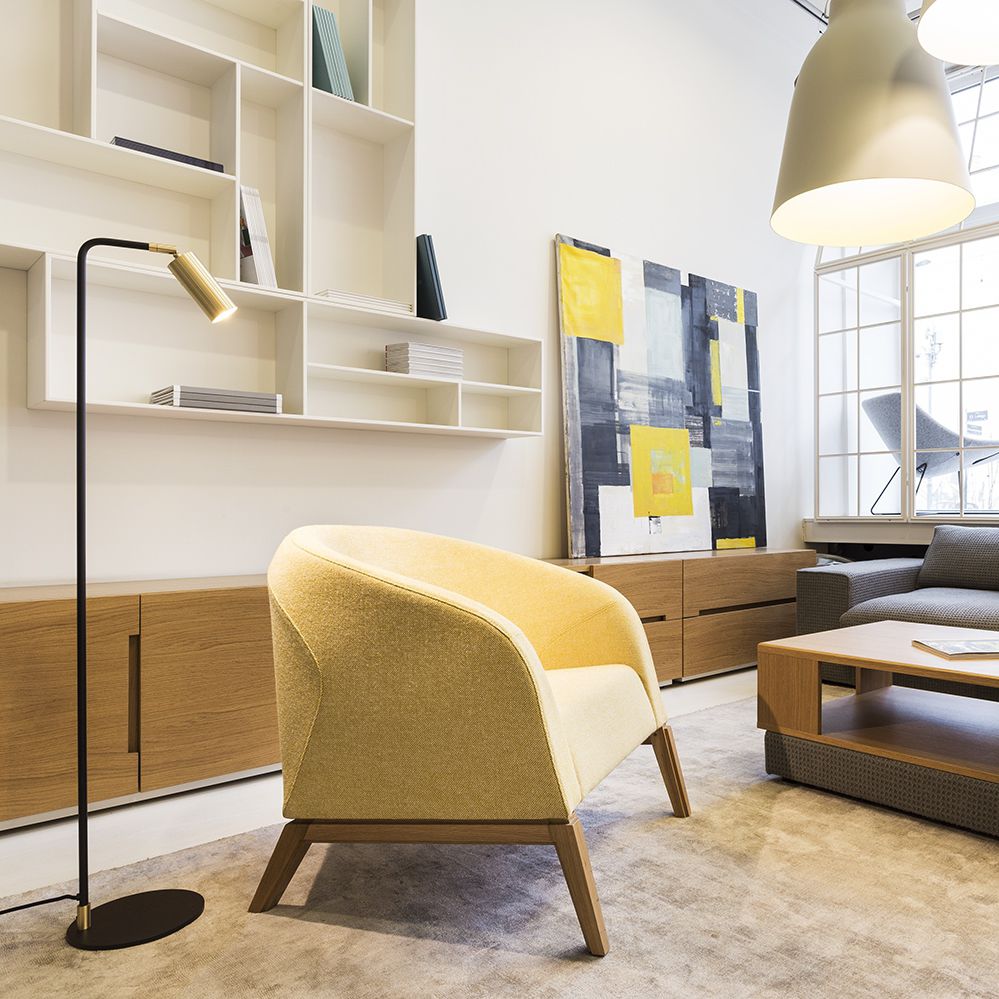 Contemporary armchair - MULA - NOTI - leather / fabric / stainless steel