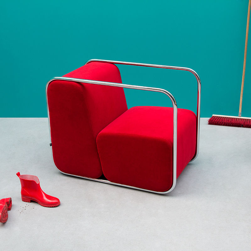 Contemporary armchair - STONE - NOTI - fabric / with footrest / commercial