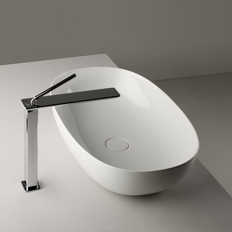 Countertop washbasin - POD H15 - VALDAMA - ceramic / oval / contemporary