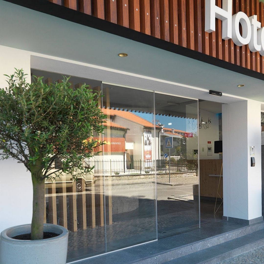 Entry door - LK 120 - FLEXIDOOR SA - metal / sliding / contemporary