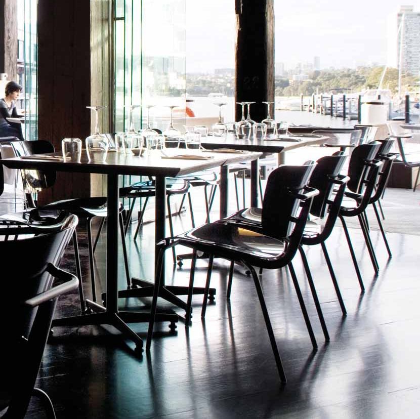 Contemporary chair - SLIDE - SEGIS - indoor / polycarbonate / steel base