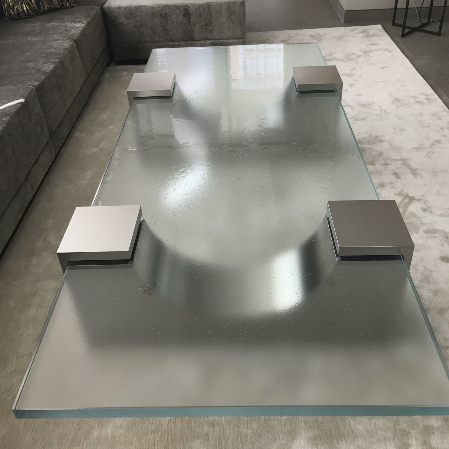 Contemporary coffee table - ThinkGlass - glass / stainless steel base ...