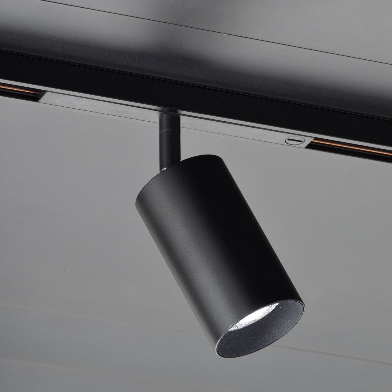 LED track light - cyl 45 - Andcosta - round / lacquered aluminum / PMMA