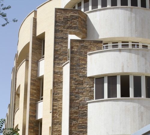 Concrete wall cladding - CLASSIC : ALTAIA AMBER - Mathios SA - exterior ...