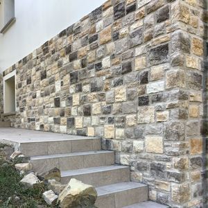 Stone wall cladding - FAVIGNANA - BIOPIETRA - exterior / interior / glued