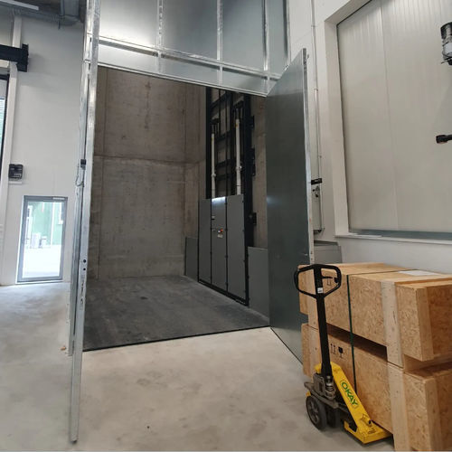 Hydraulic freight elevator - DL Series - Updinamic - for heavy loads / for furniture / for catering